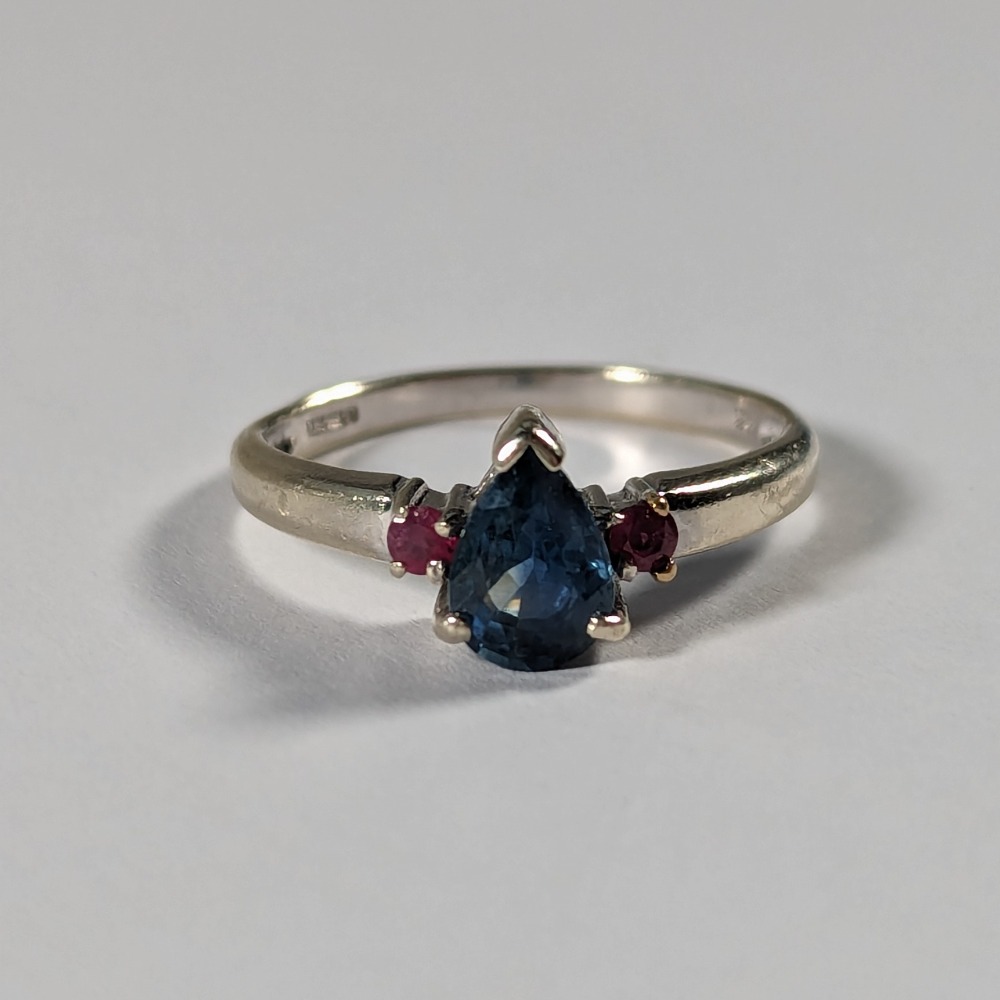 Pre-owned 9ct White Gold Pear-Shape Blue Sapphire Round Ruby Trilogy Style Ring Size M1/2 - Own4Less